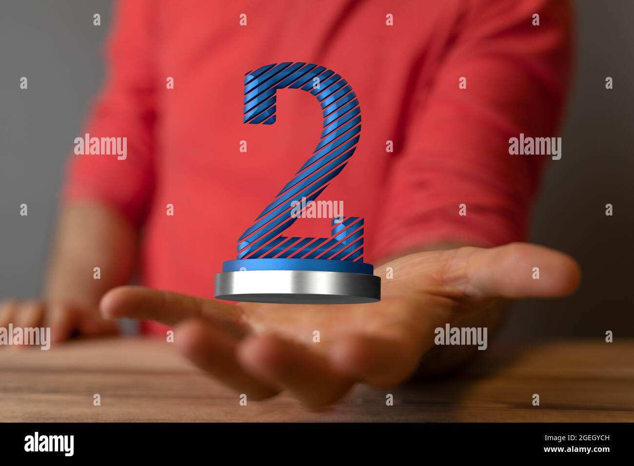 Success 2nd place in hand Stock Photo - Alamy