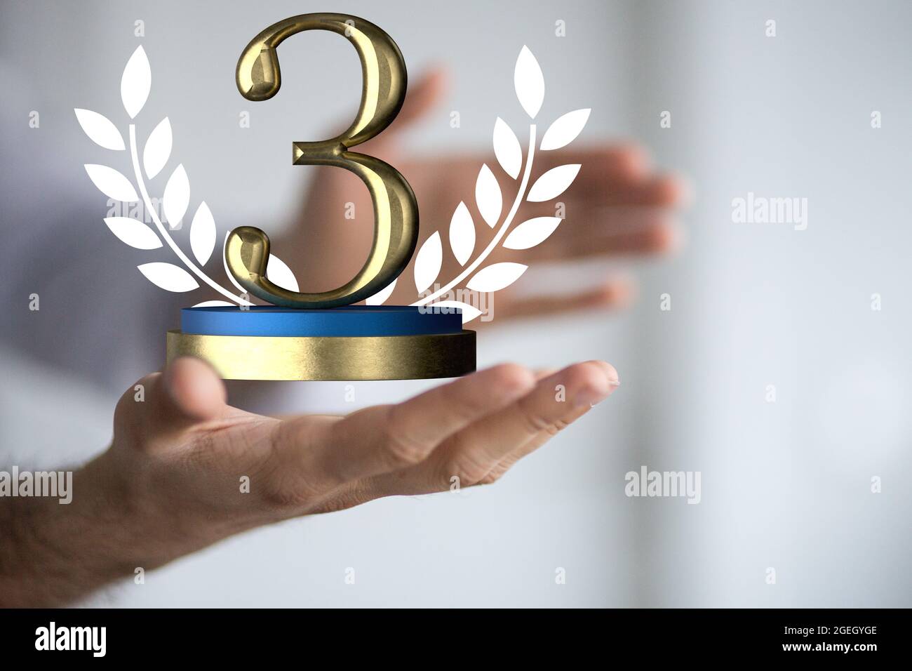 3rd place letter in 3d in hand Stock Photo - Alamy
