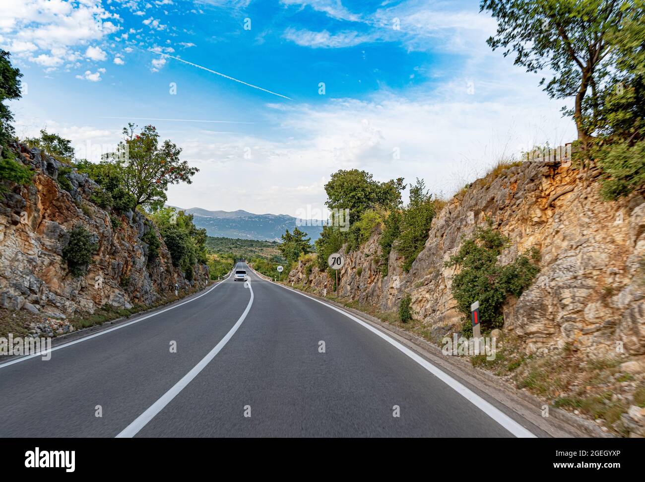 Scenic road. Road is surrounded by a magnificent natural landscape ...
