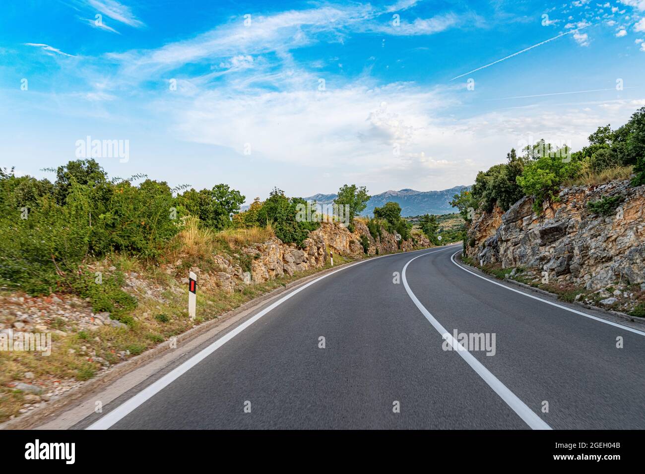 Scenic road. Road is surrounded by a magnificent natural landscape ...
