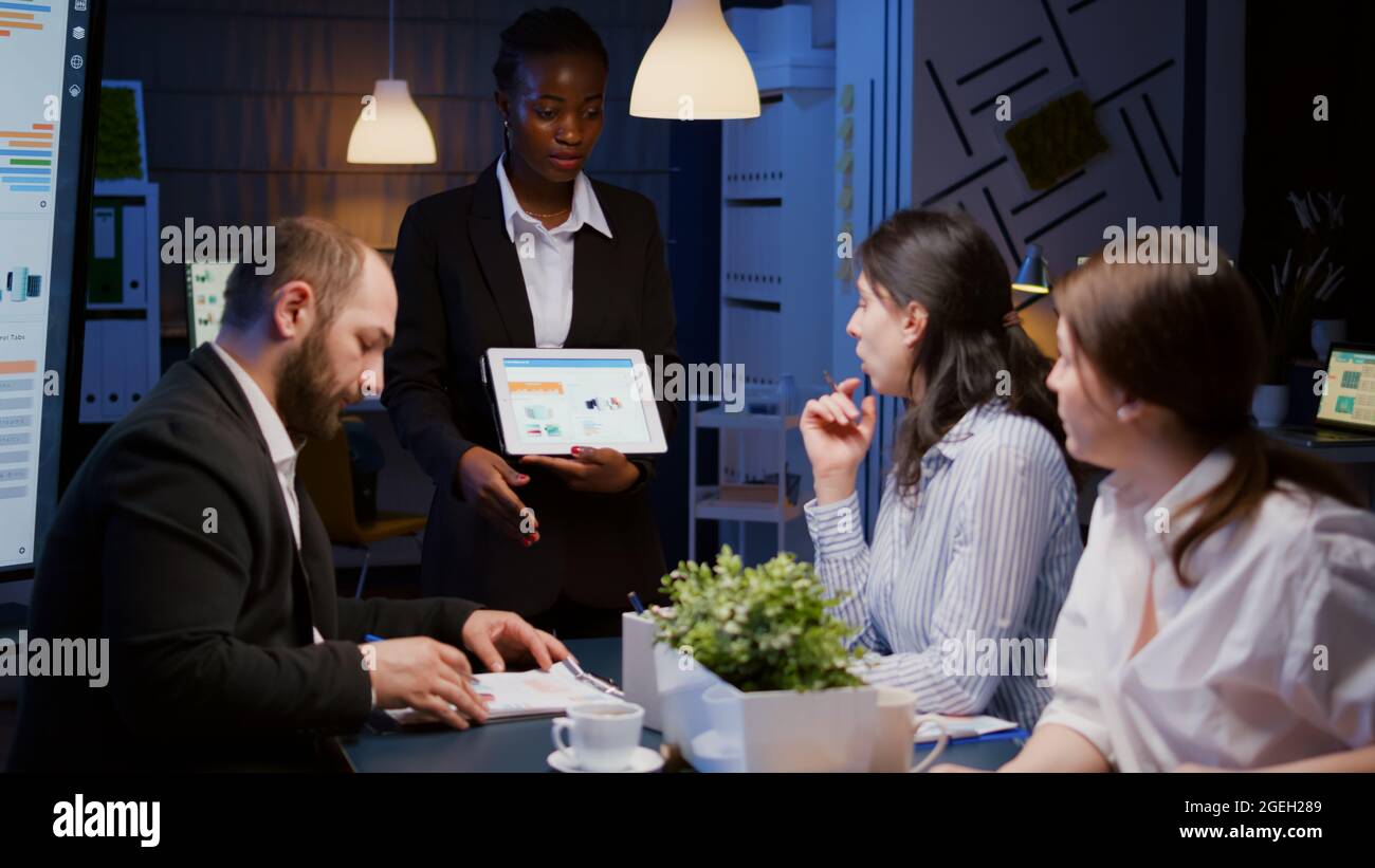 Exhausted workaholic african american showing hi-res stock photography ...