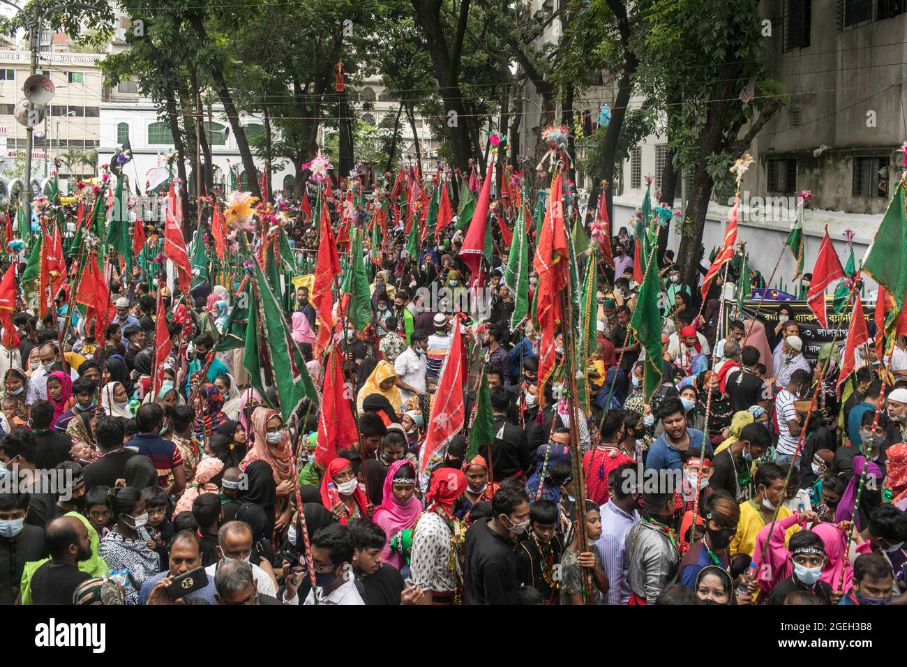 Bangladeshi Shia Muslims take part in a ritual religious procession ...