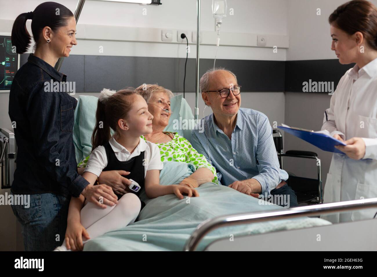 Physician doctor discussing sickness symptoms with retired elderly ...