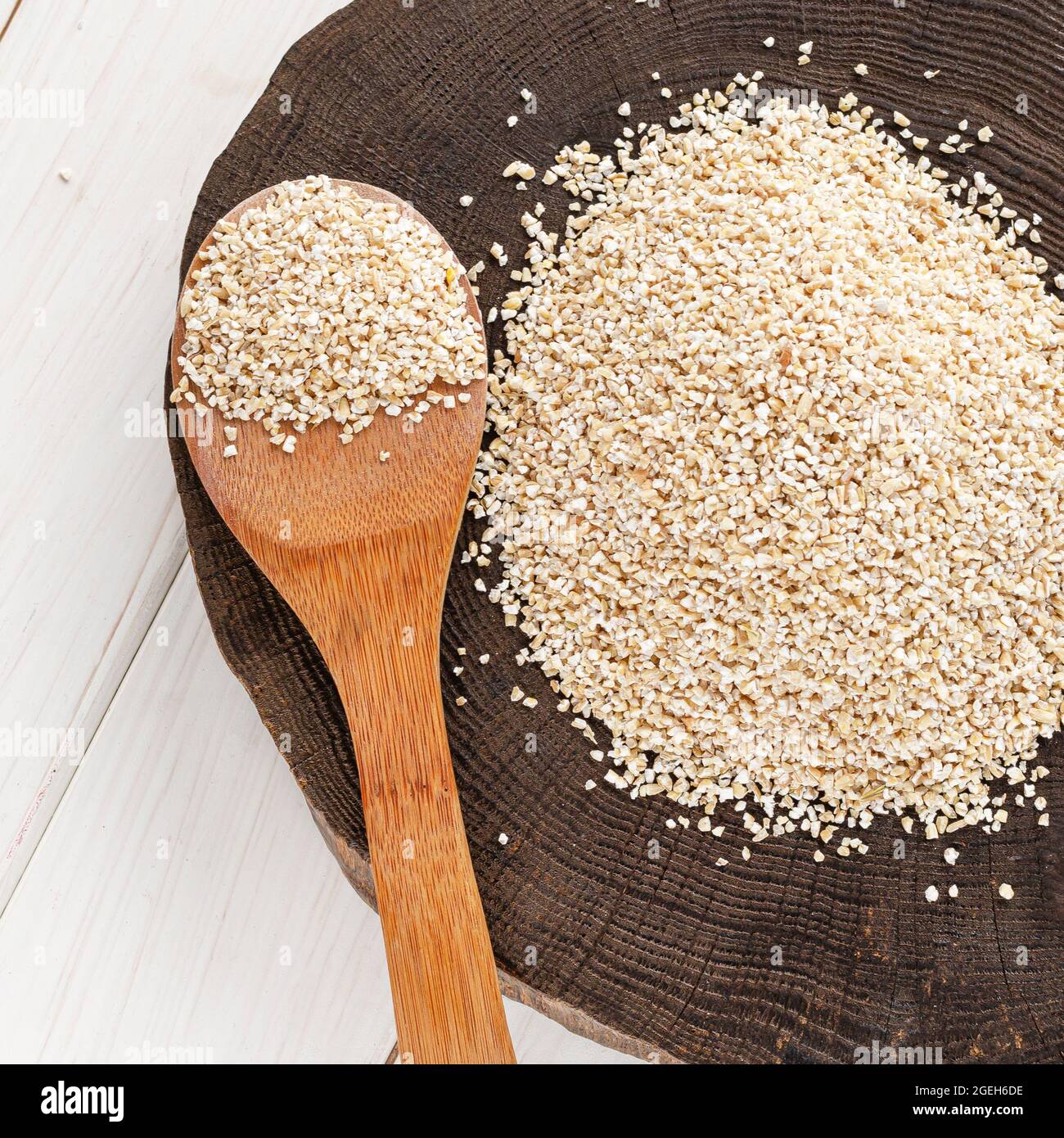 Raw dried broken barley cereal grain texture background macro closeup ...