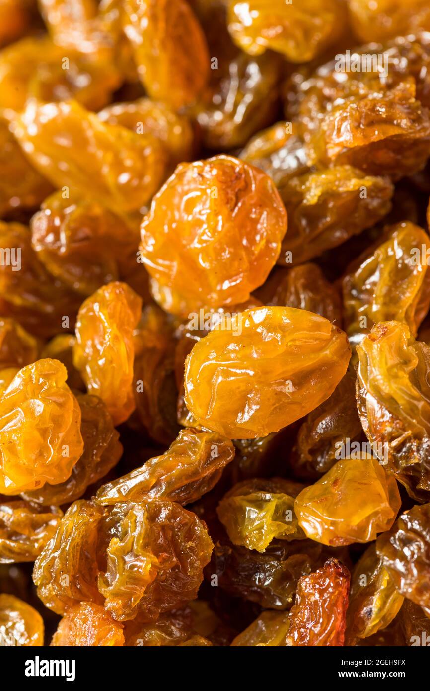 Healthy Organic Golden Raisins in a Bowl Stock Photo - Alamy