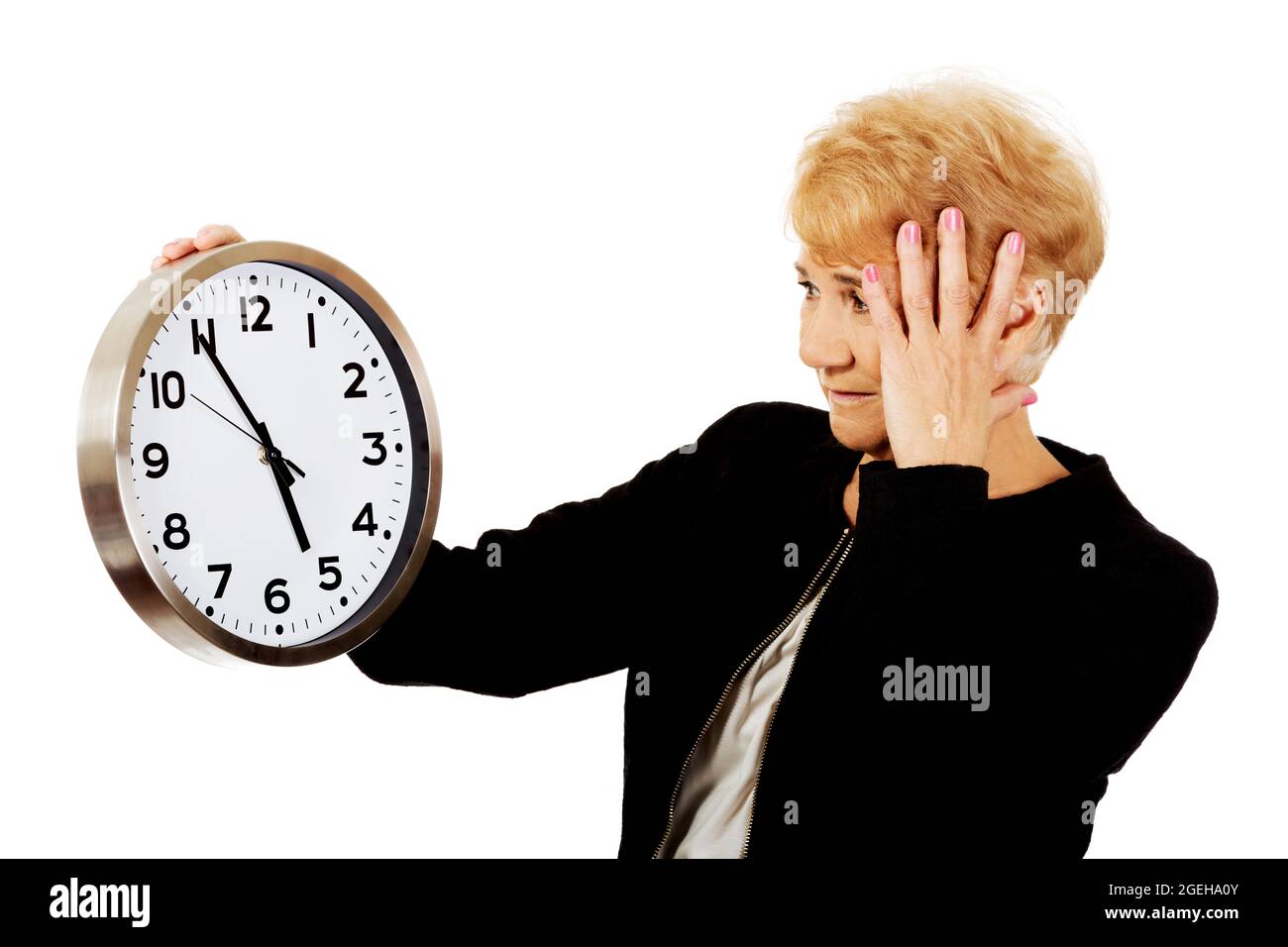 Clock woman senior office hi-res stock photography and images - Alamy