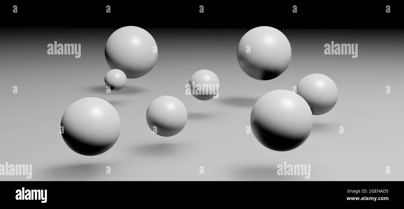 Floating 3D spheres or balls above ground on monochrome background ...