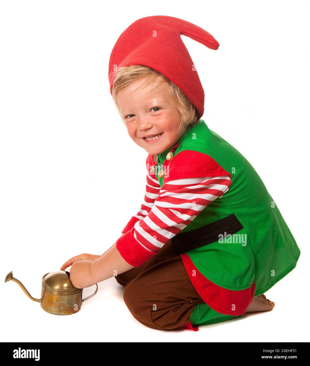 Boy dressed as a garden gnome with a watering can Stock Photo - Alamy