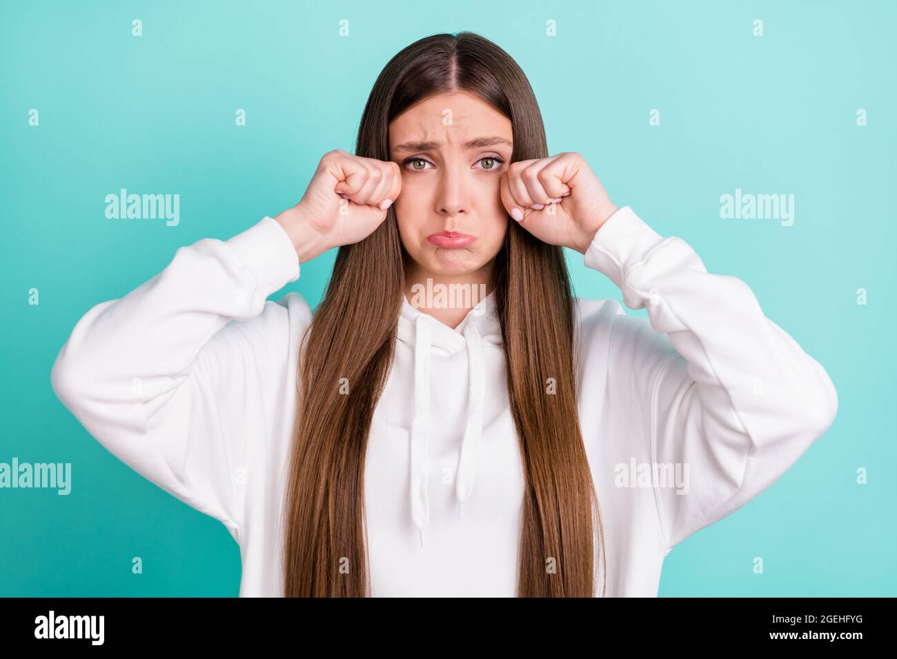 Photo of unhappy upset young woman cry bad mood hold hands face tears ...