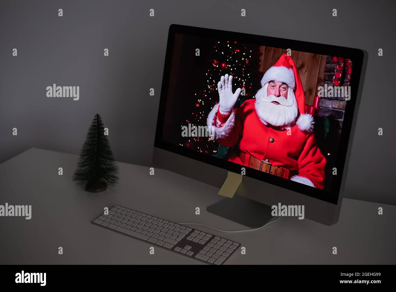 Santa Claus remotely wishes Merry Christmas via a video call on the ...