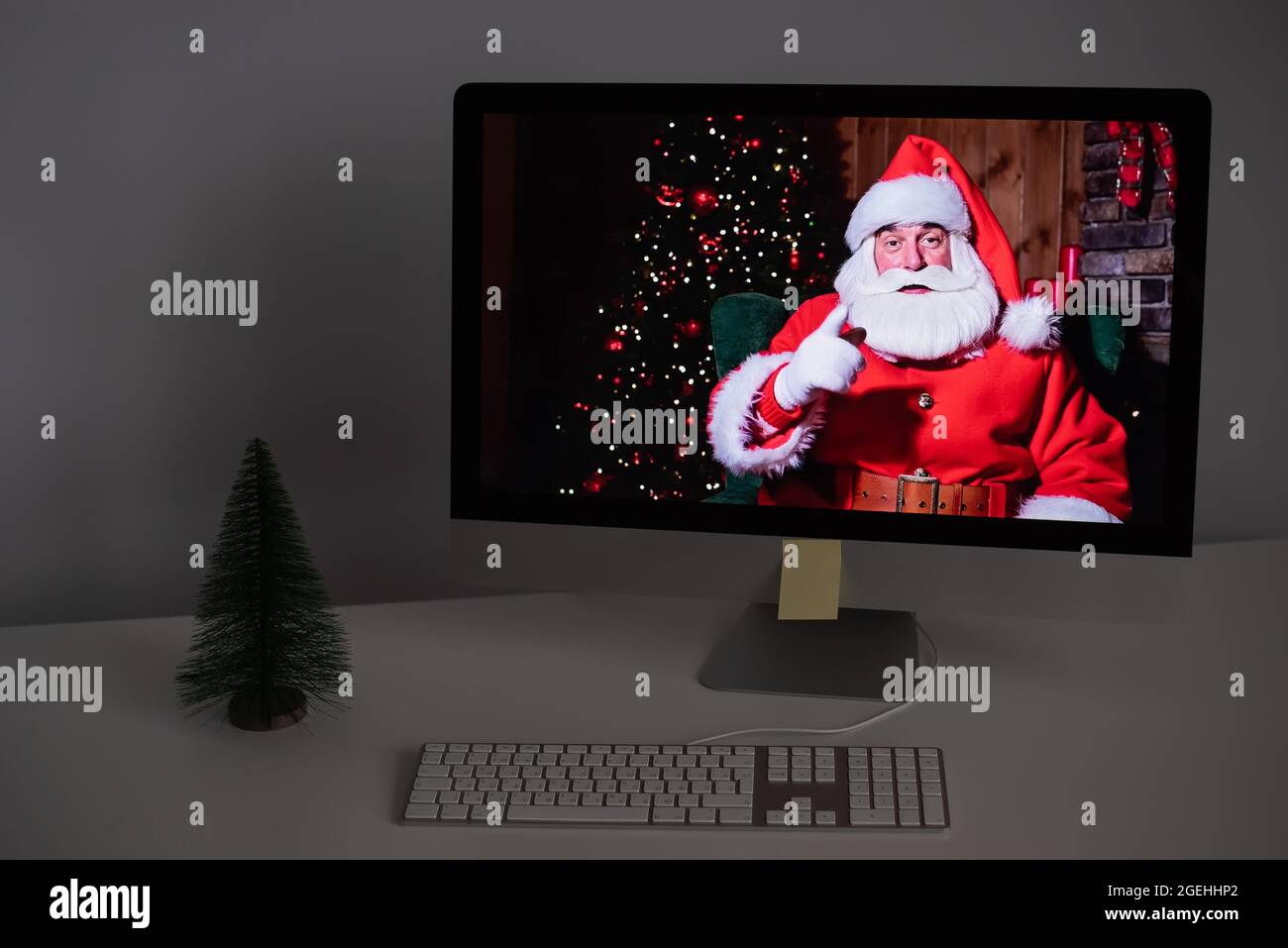 Santa Claus remotely wishes Merry Christmas via a video call on the ...