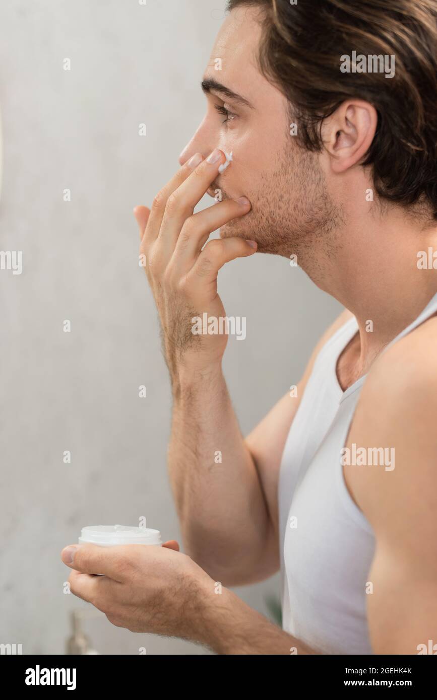 Apply cream man hi-res stock photography and images - Alamy