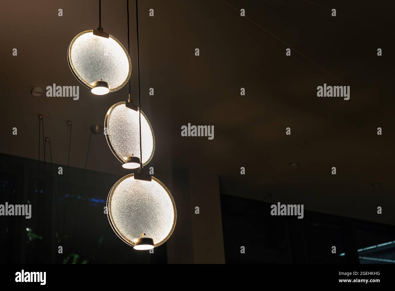 Elegant stylish chandelier. Modern led pendant light lamp illuminated ...