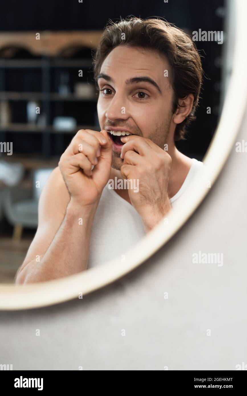 Man cleaning teeth hi-res stock photography and images - Alamy