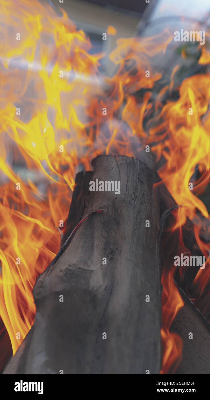 Closeup of burning fire in a grill Stock Photo - Alamy