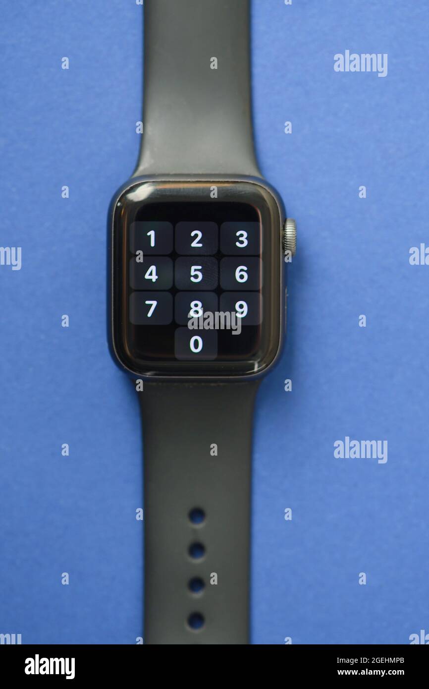Overhead of a modern watch with touch screen on blue background Stock ...