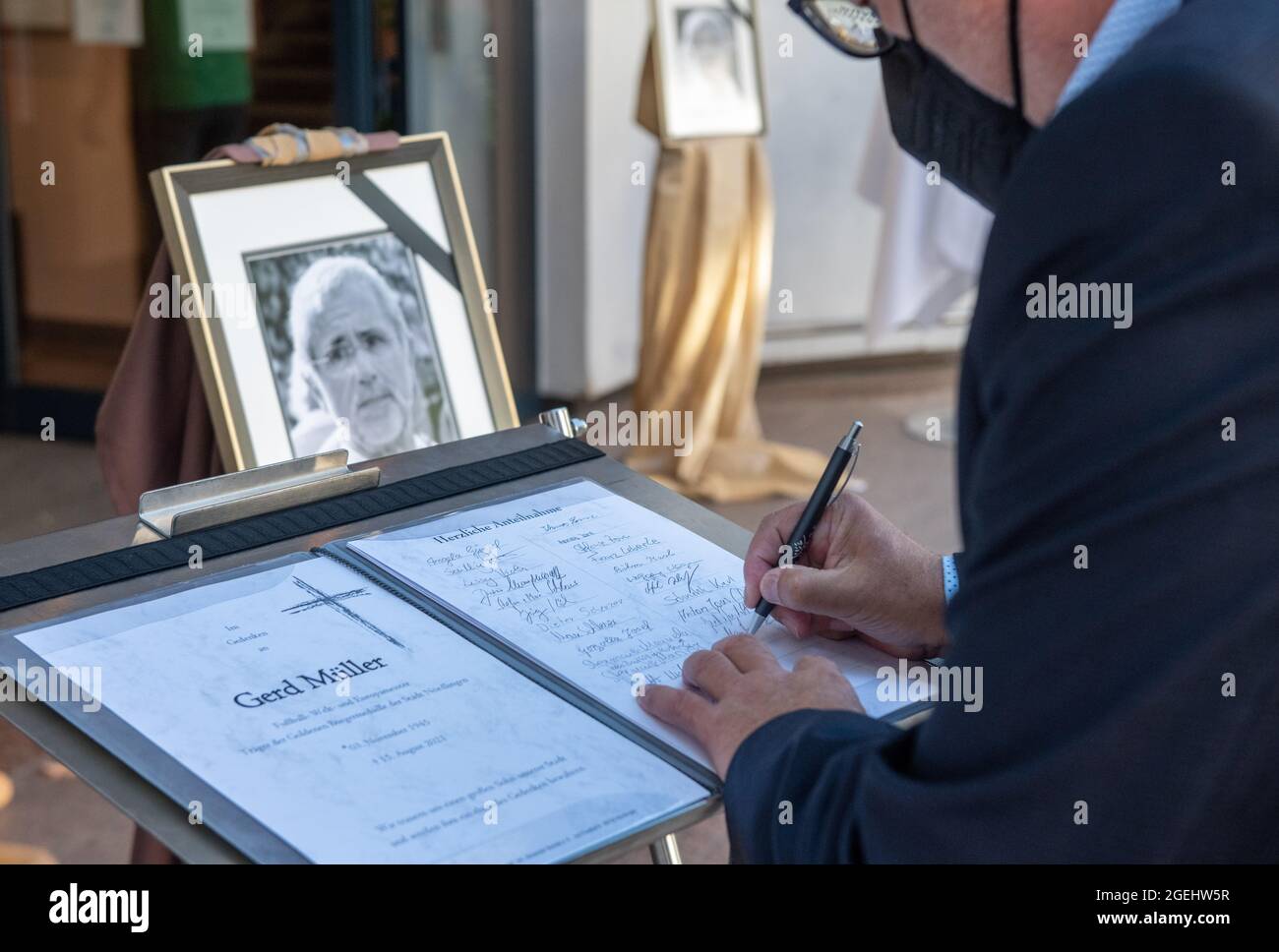 Bavaria, Germany. August 20 2021: A mourner signs the condolence list ...
