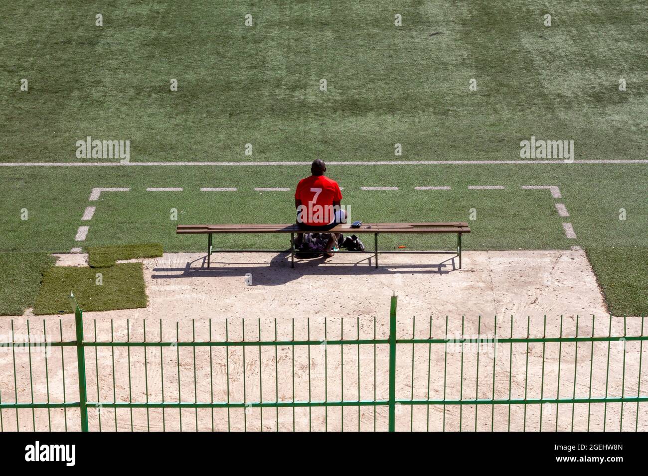 Football sits bench hi-res stock photography and images - Alamy