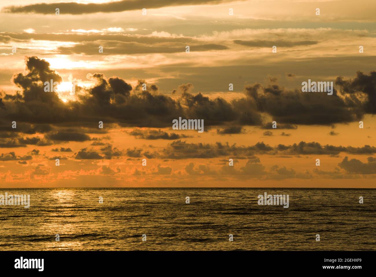 Beautiful scenery of the Black Sea at sunset with breathtaking clouds ...