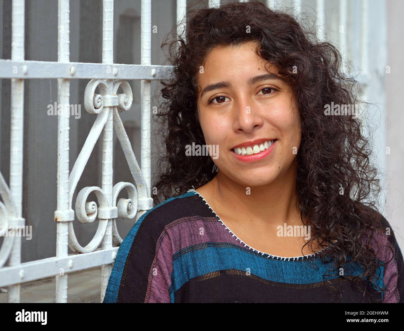 Beautiful positive emotional young Mexican Latina Hispanic woman with ...