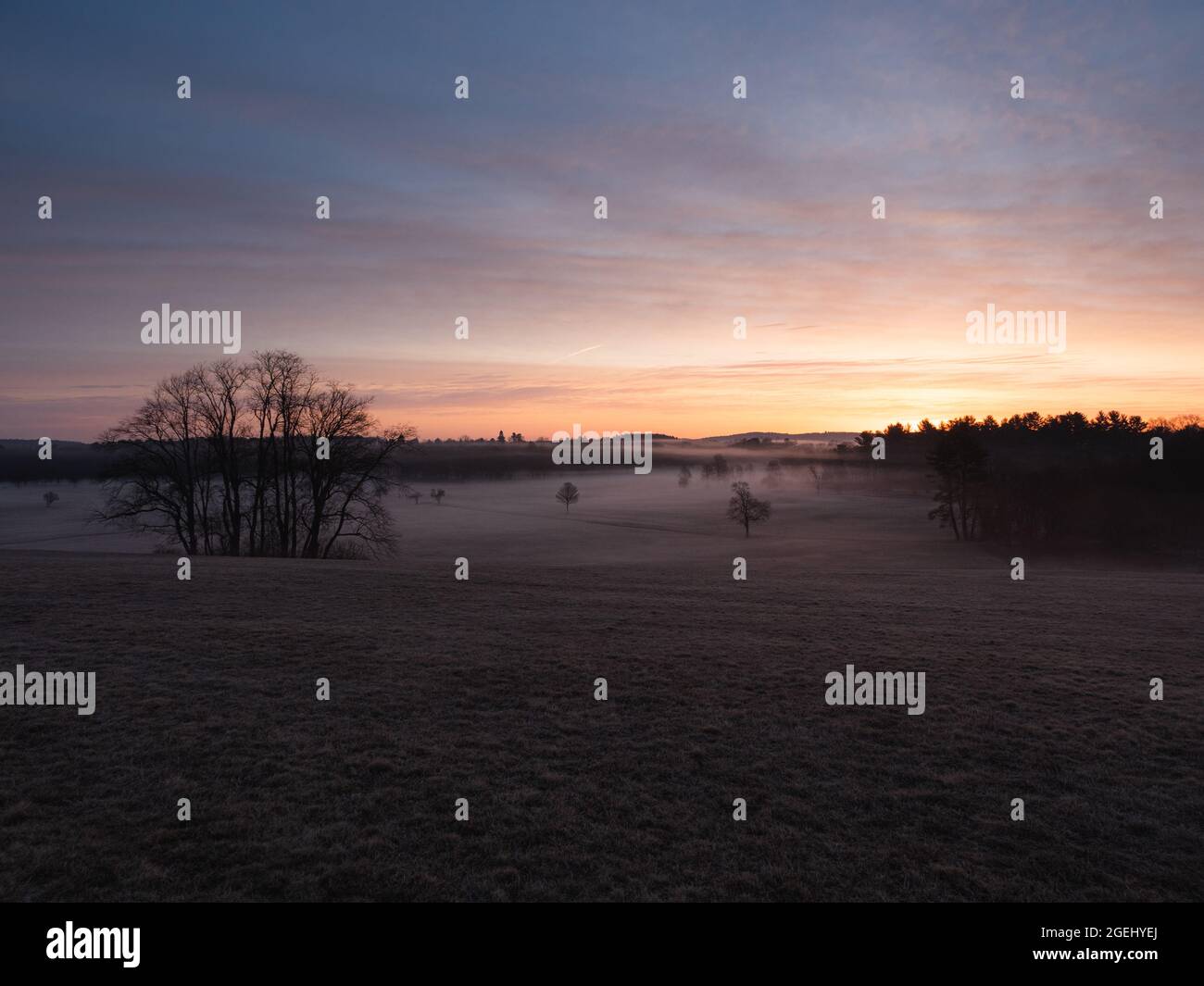 Sunrise over farm field hi-res stock photography and images - Alamy