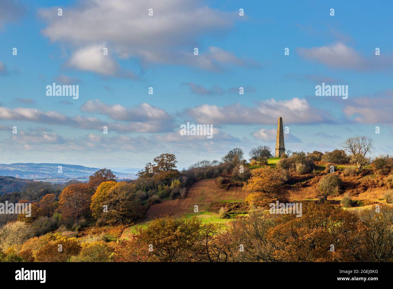An autumn view of Eastnor Castle Oberlisk in the Malvern Hills, England ...