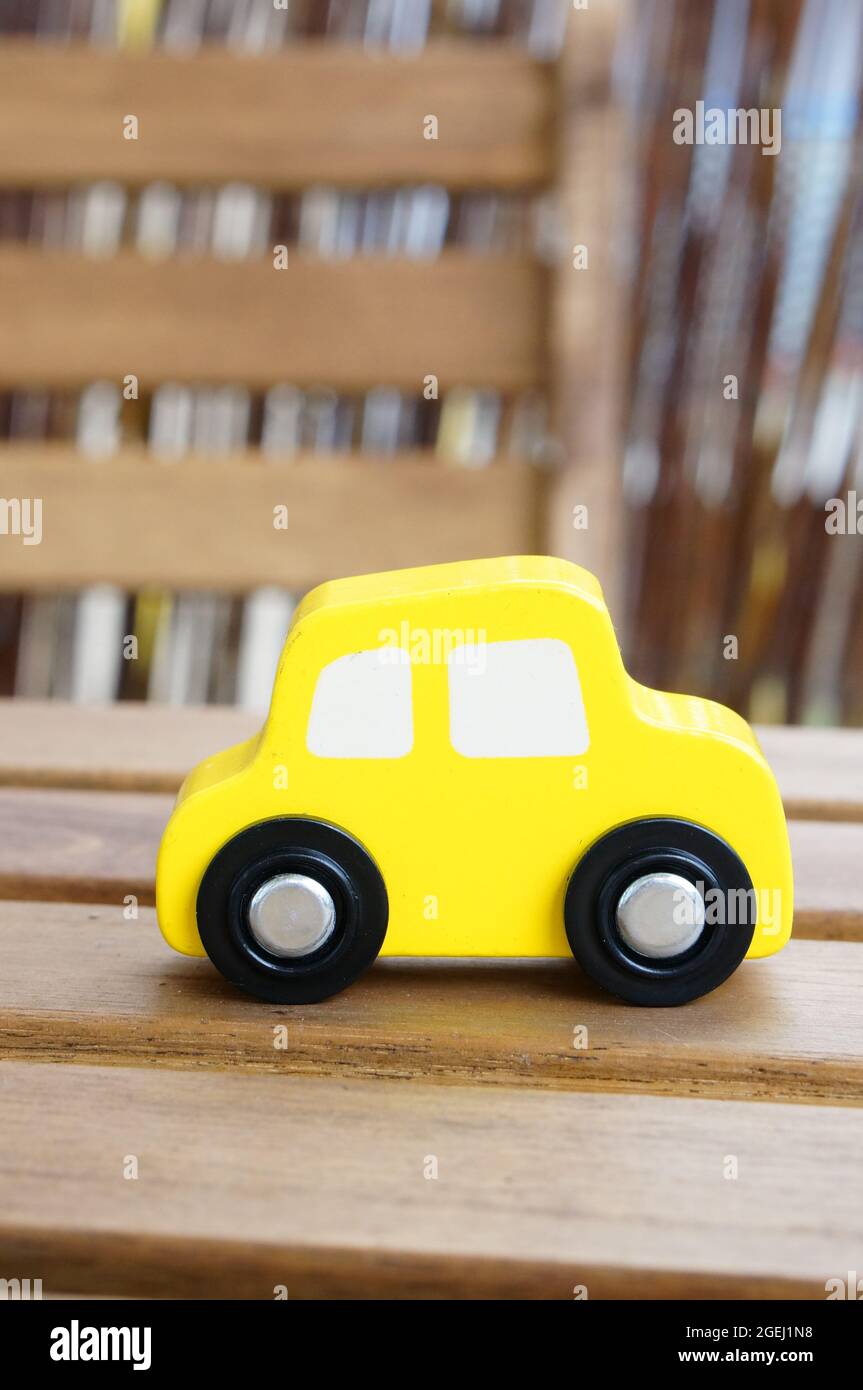 Macro shot of yellow, plastic, toy car Stock Photo - Alamy