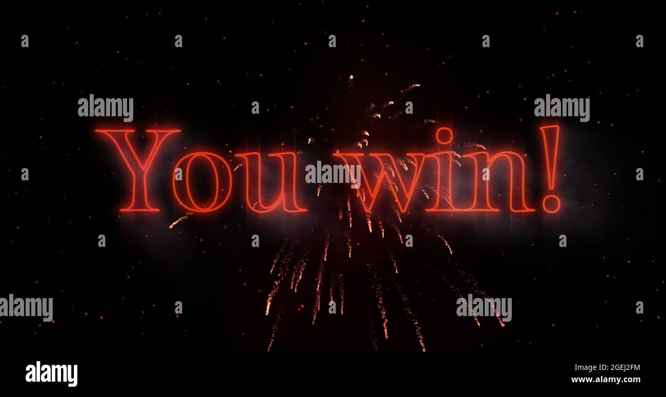 Image of you win text in red glowing letters over explosion of red ...