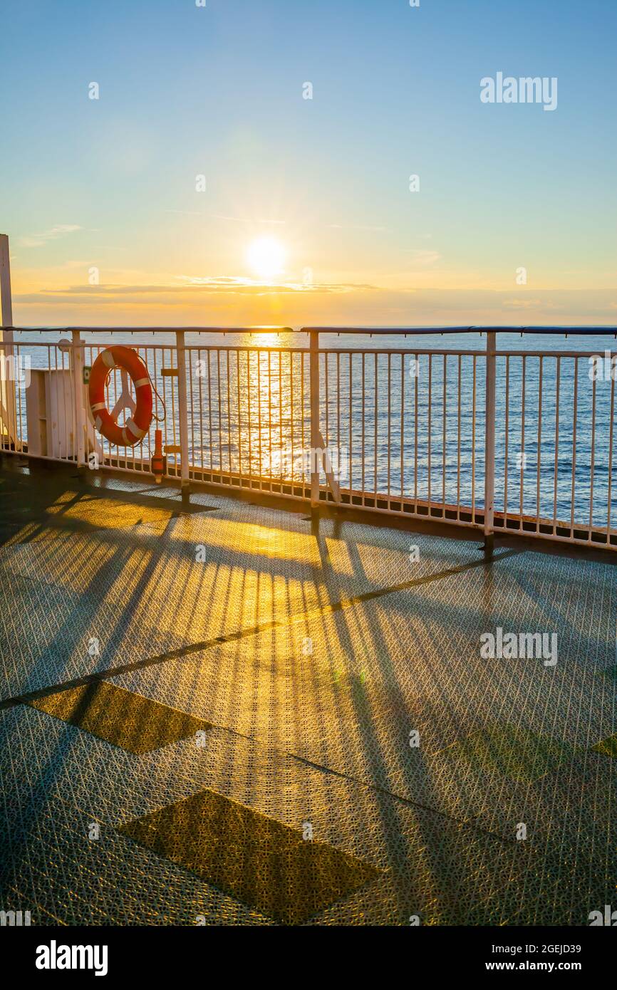 Open deck on a cruise ship and shining sun over the sea - seascape ...