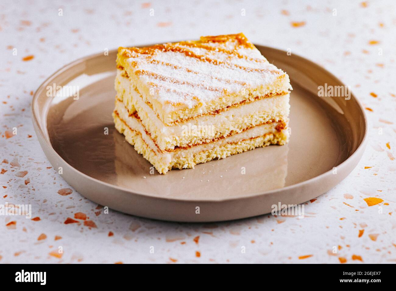 Cream Cake Slice on a Plate Stock Photo - Alamy