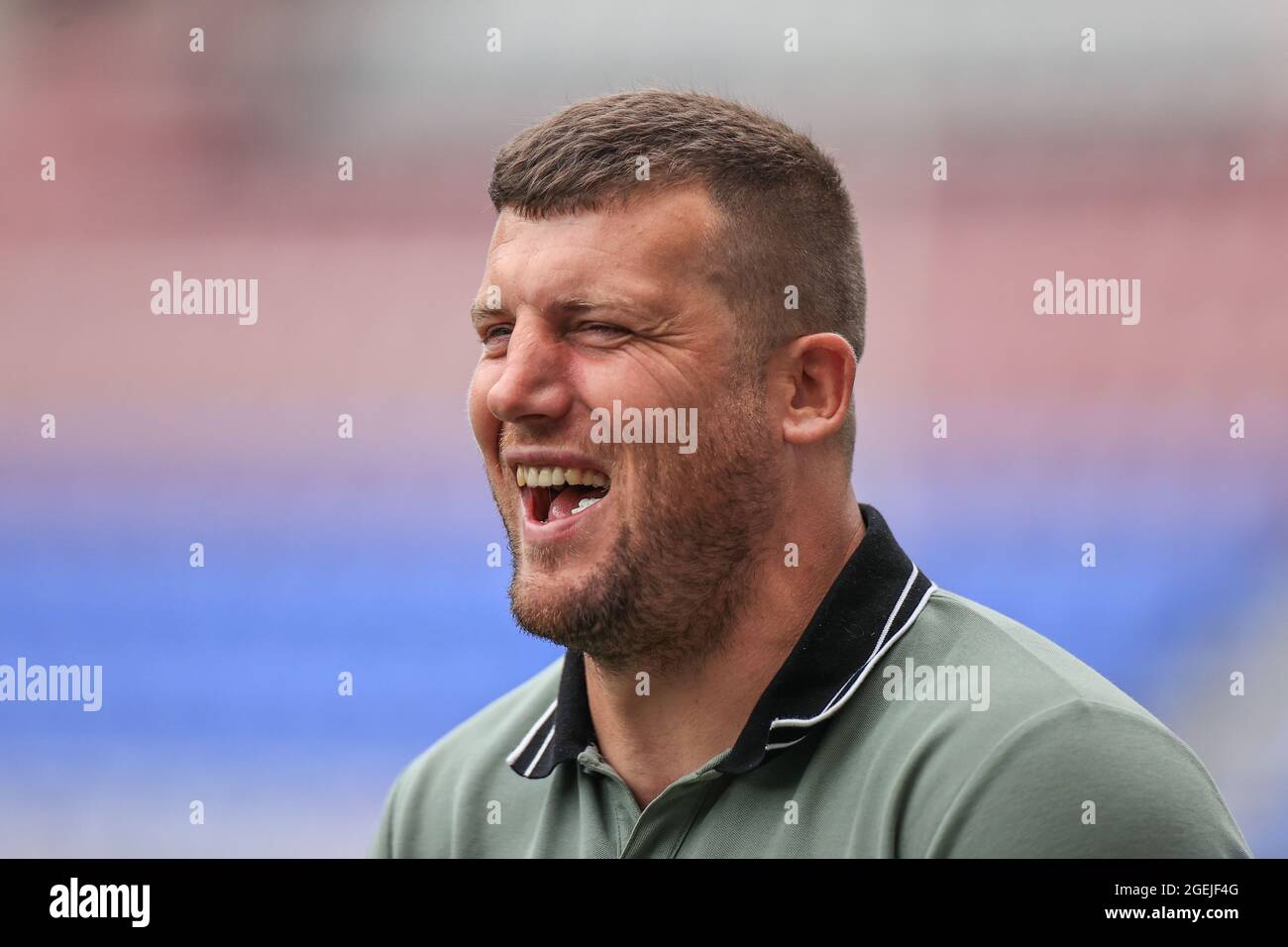 Tony Clubb (17) of Wigan Warriors full of smiles as he arrives at the ...