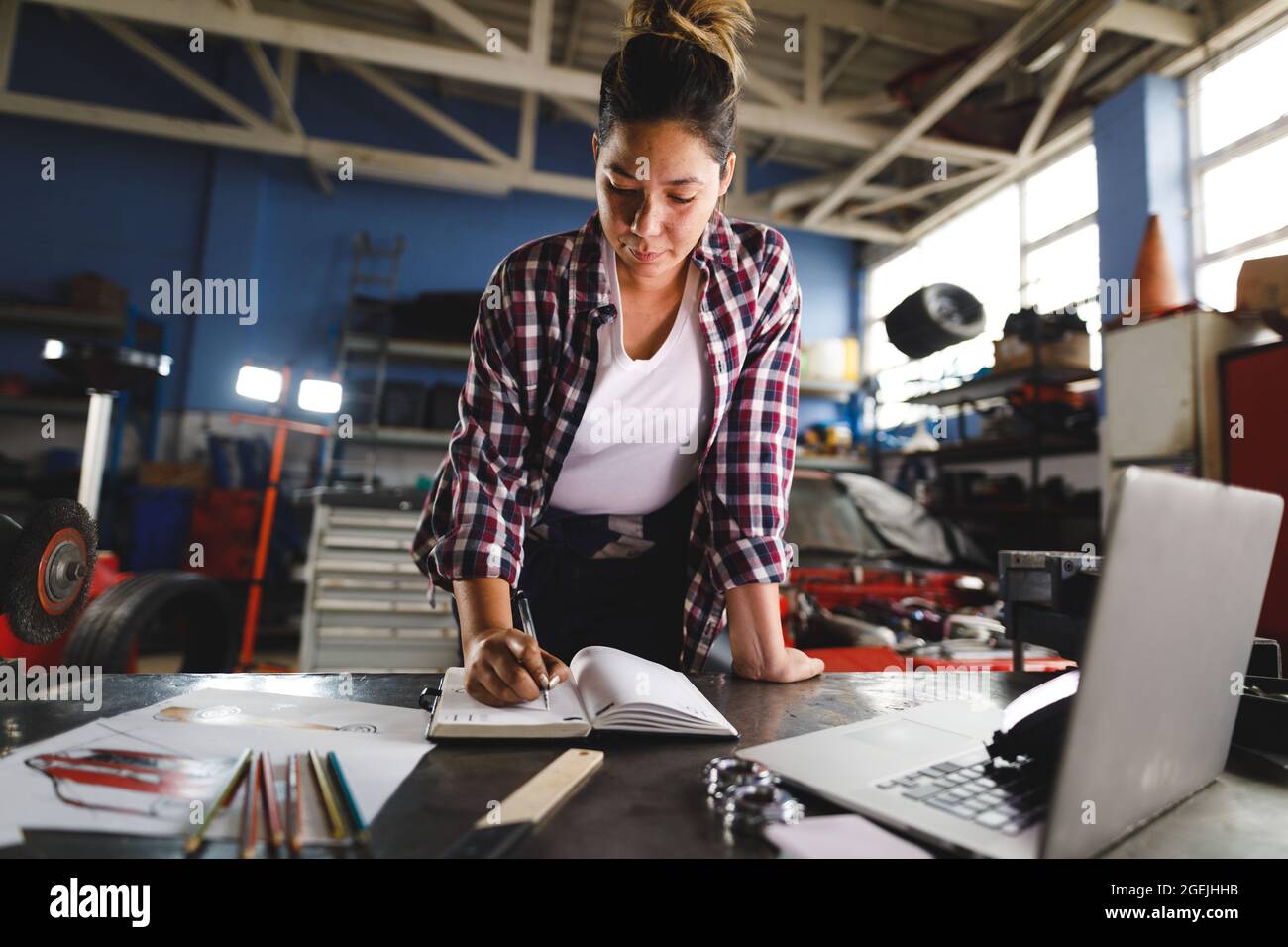 Mixed race people doing paperwork hi-res stock photography and images ...