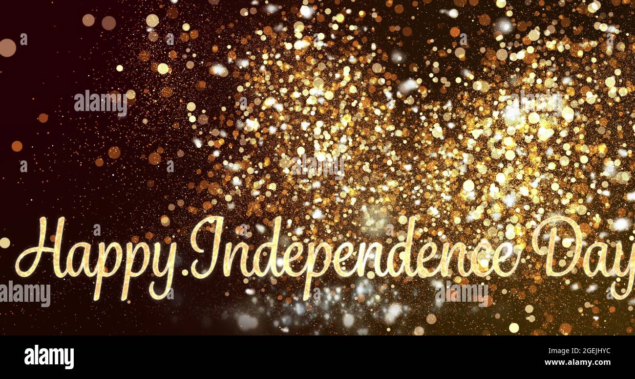 Image of happy independence day text in gold glitter letters over ...