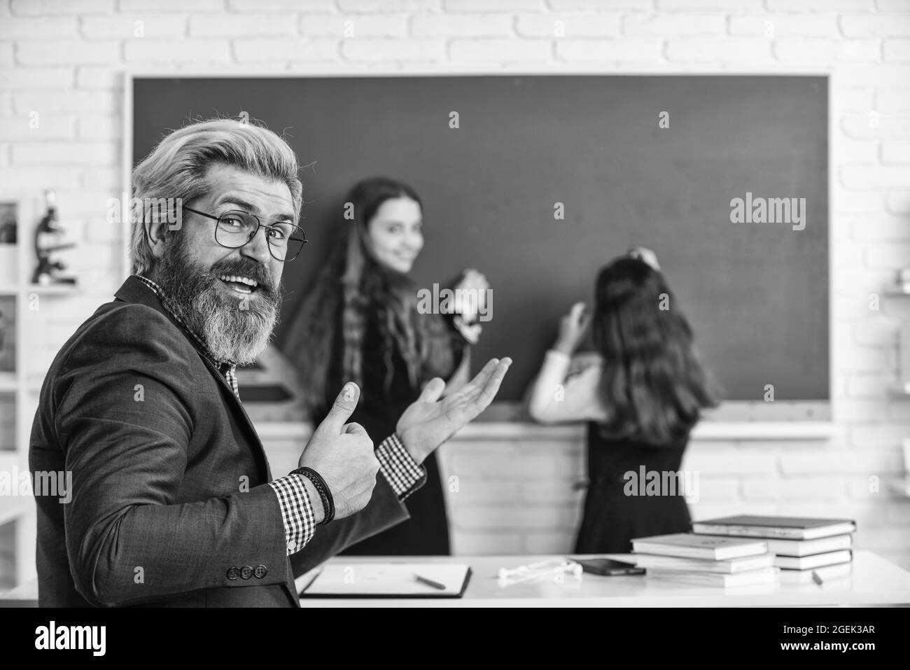 disclose and develop creativity. selective focus. Teacher working with ...