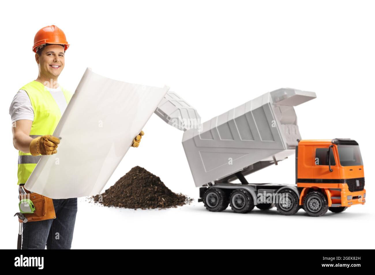 Full length shot of an engineer at a construction site with a dump ...