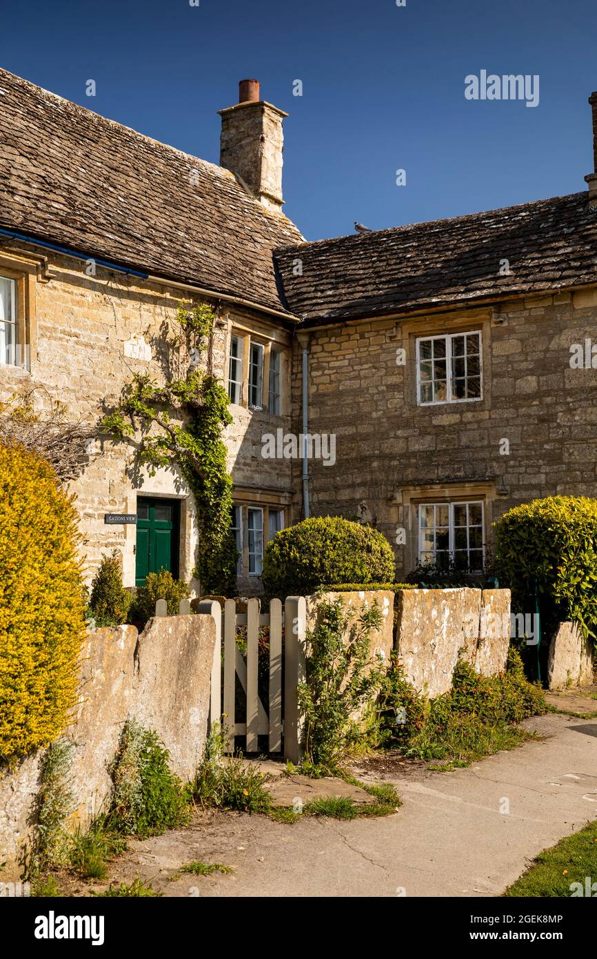 UK, England, Oxfordshire, Filkins, stone slab fence outside Gassons ...