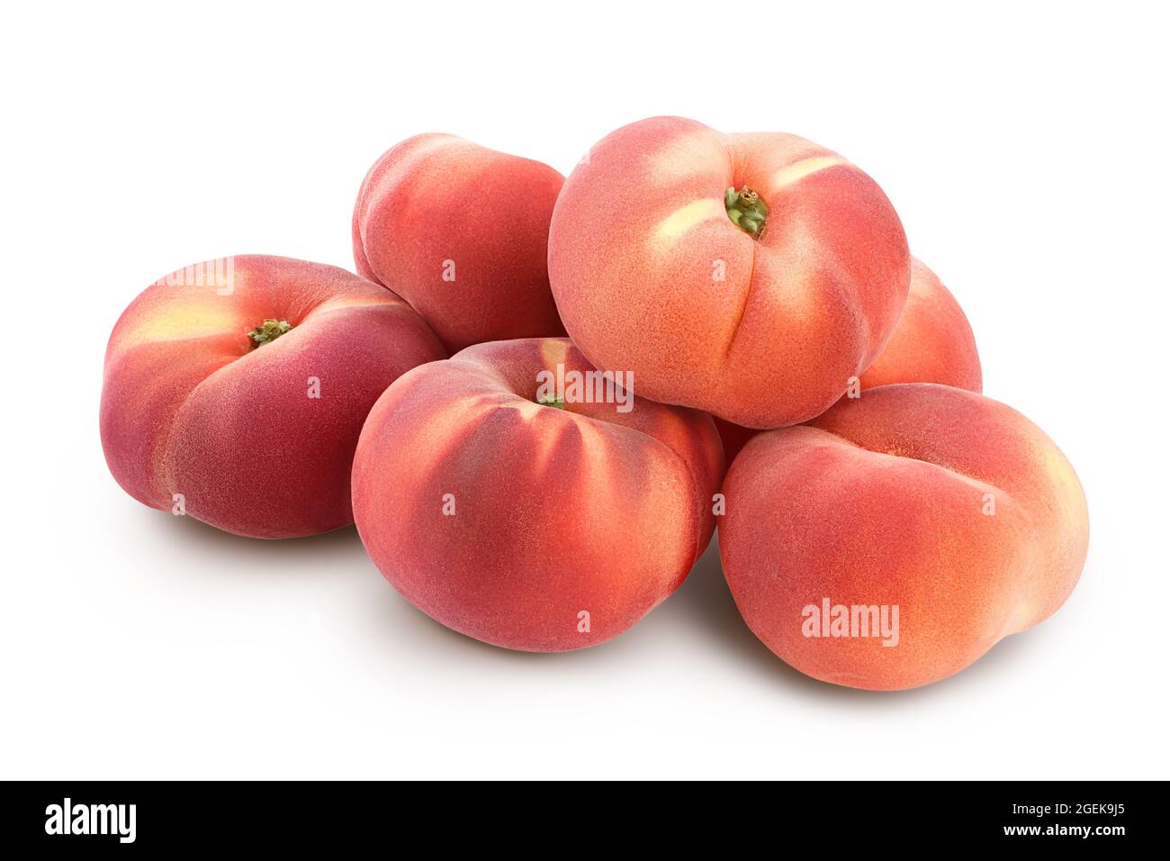 Ripe chinese flat peach fruit with leaf isolated on white background ...