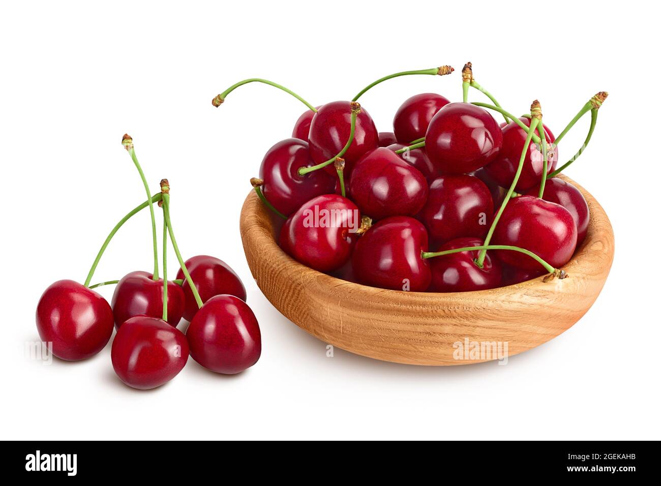 red sweet cherry in wooden bowl isolated on white background with ...