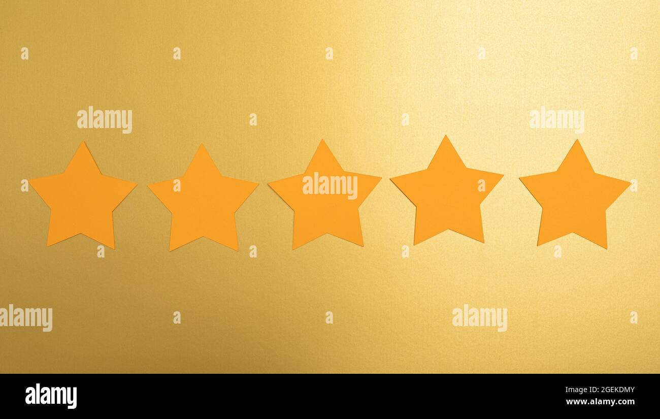 Background of feedback and review stars in yellow Stock Photo - Alamy