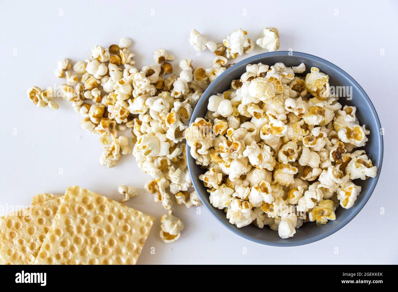 Top view of a bowl of popcorn on a white background Stock Photo - Alamy
