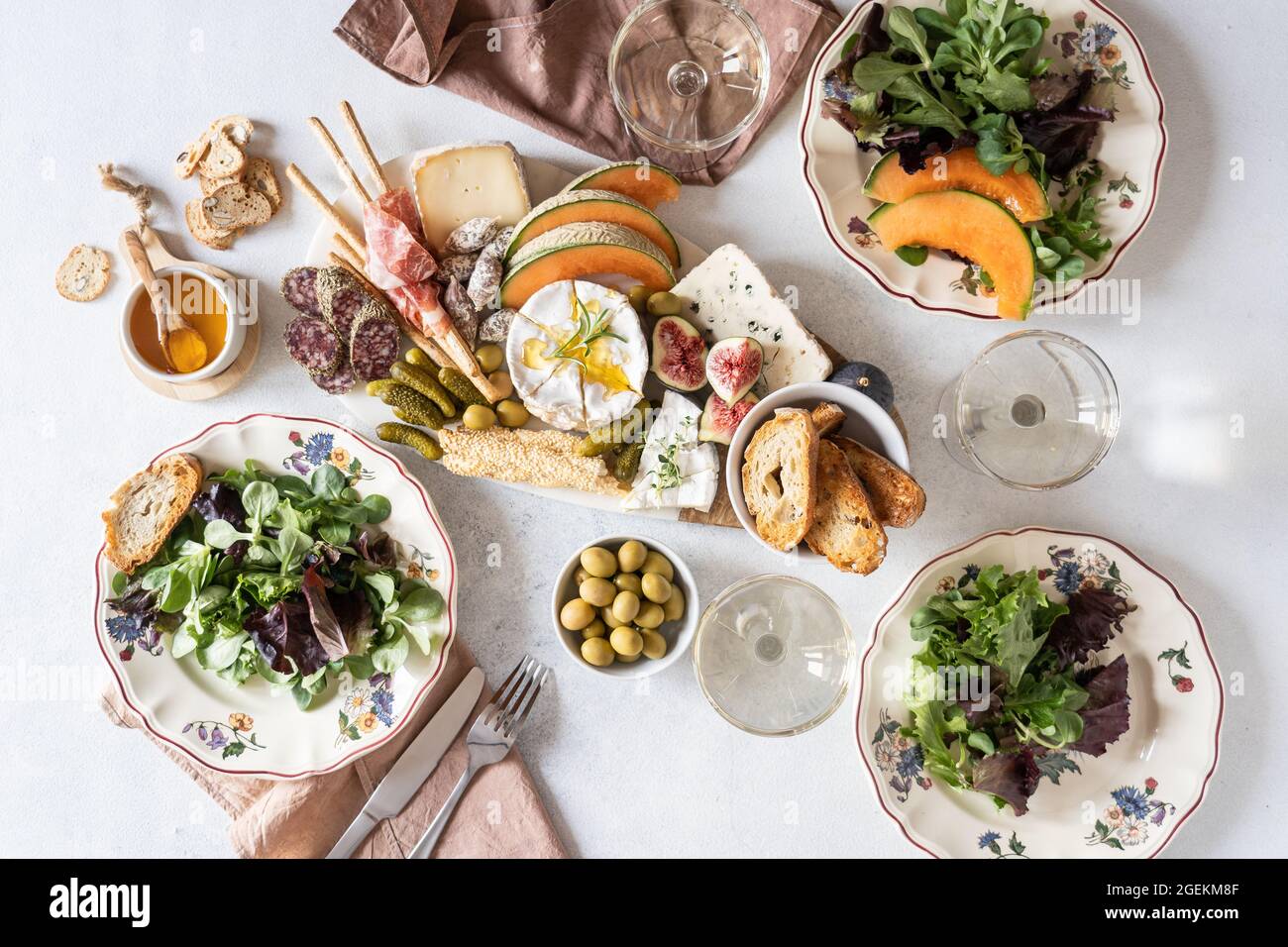 Snacks table with Italian snacks and wine in glasses. Brushetta, a kind ...