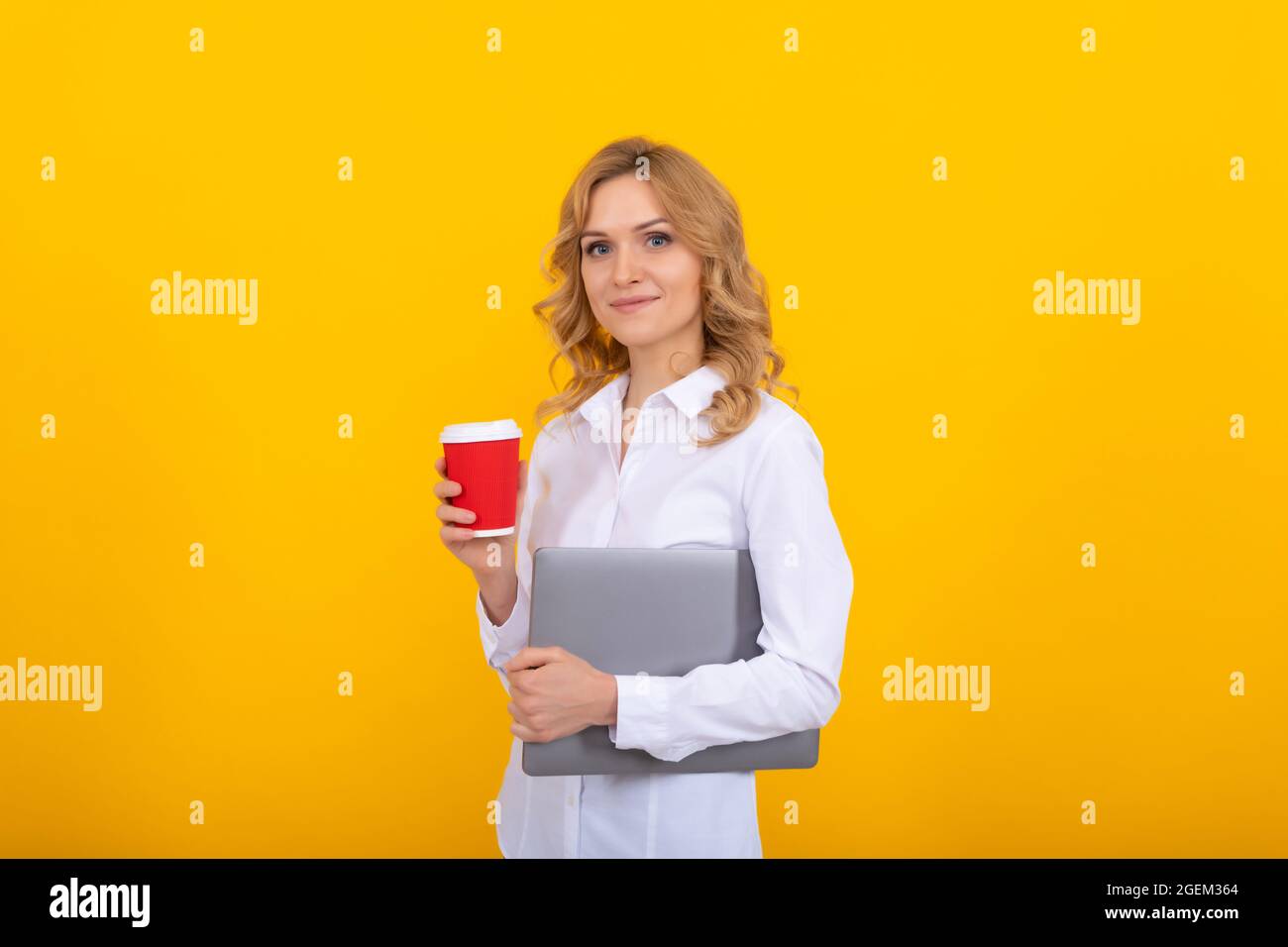 Professional business woman with laptop hold takeaway coffee or tea ...