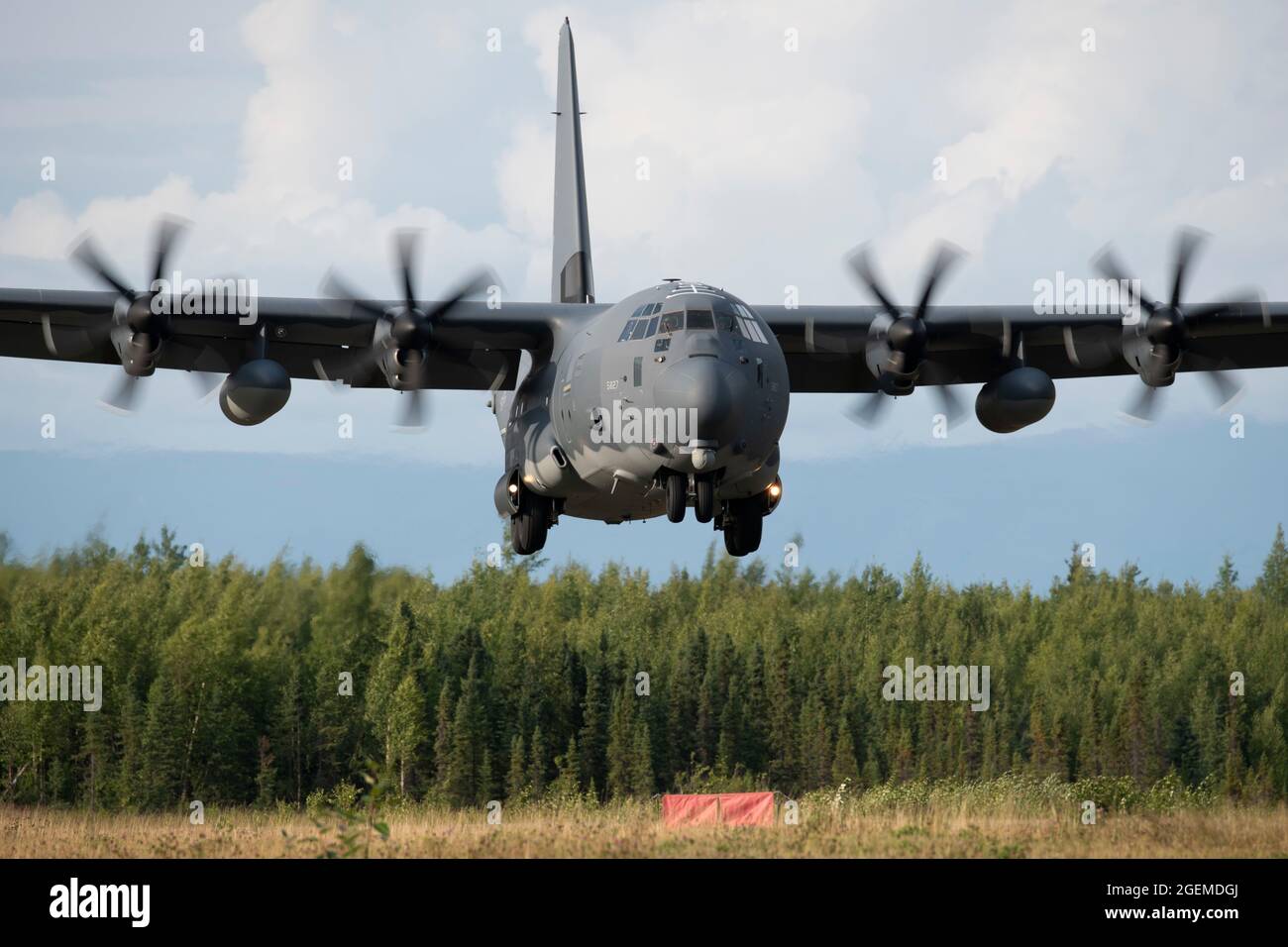 An Alaska Air National Guard HC-130J Combat King II operated by aircrew ...
