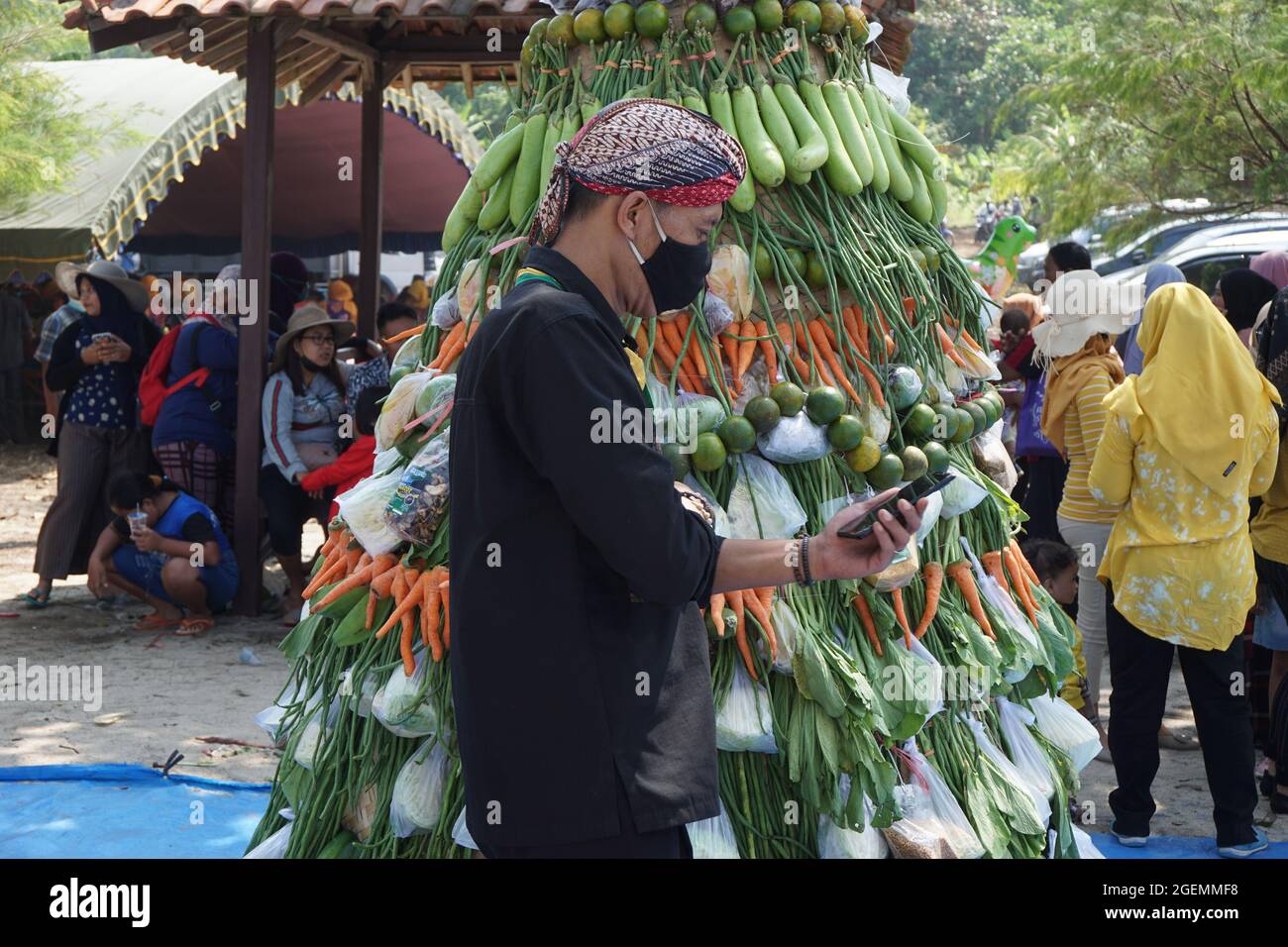 Tumpeng sayur (vegetable cone) on the ceremony of sedekah bumi ...