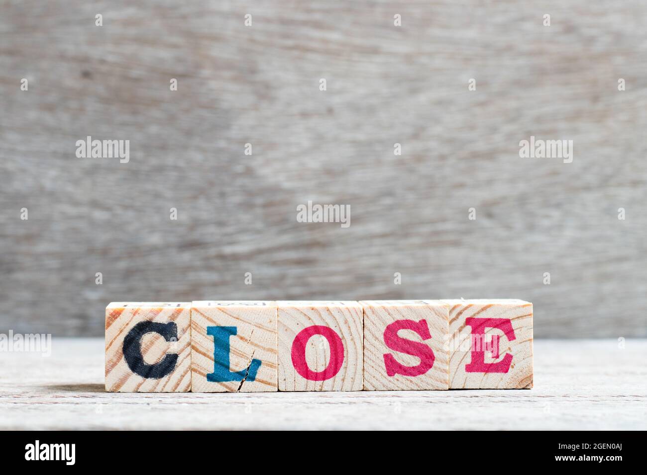 Letter block in word close on wood background Stock Photo - Alamy