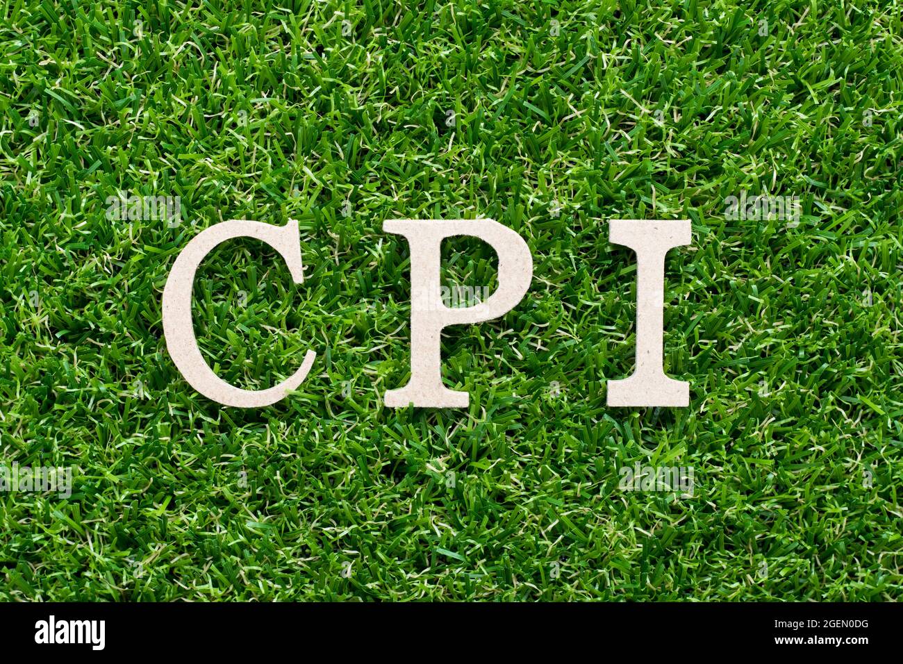 Wood alphabet in word CPI (abbreviation of consumer price index) on ...