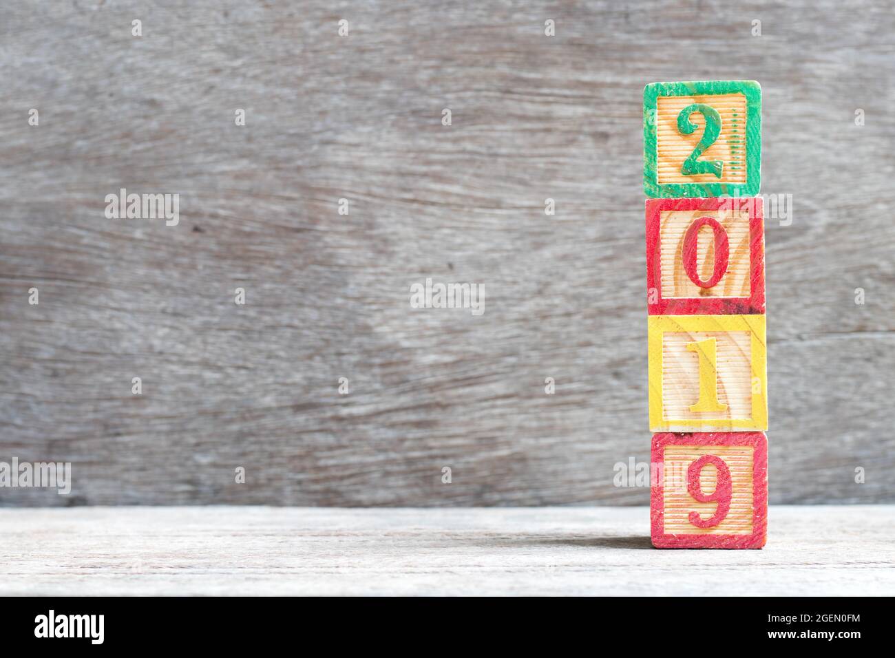 Color letter block in word 2019 on wood background (Concept for happy ...