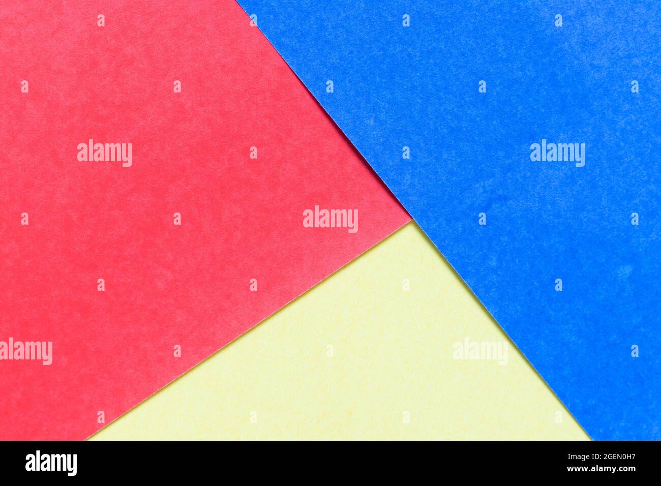 Abstract red, yellow, blue color paper background for design and ...