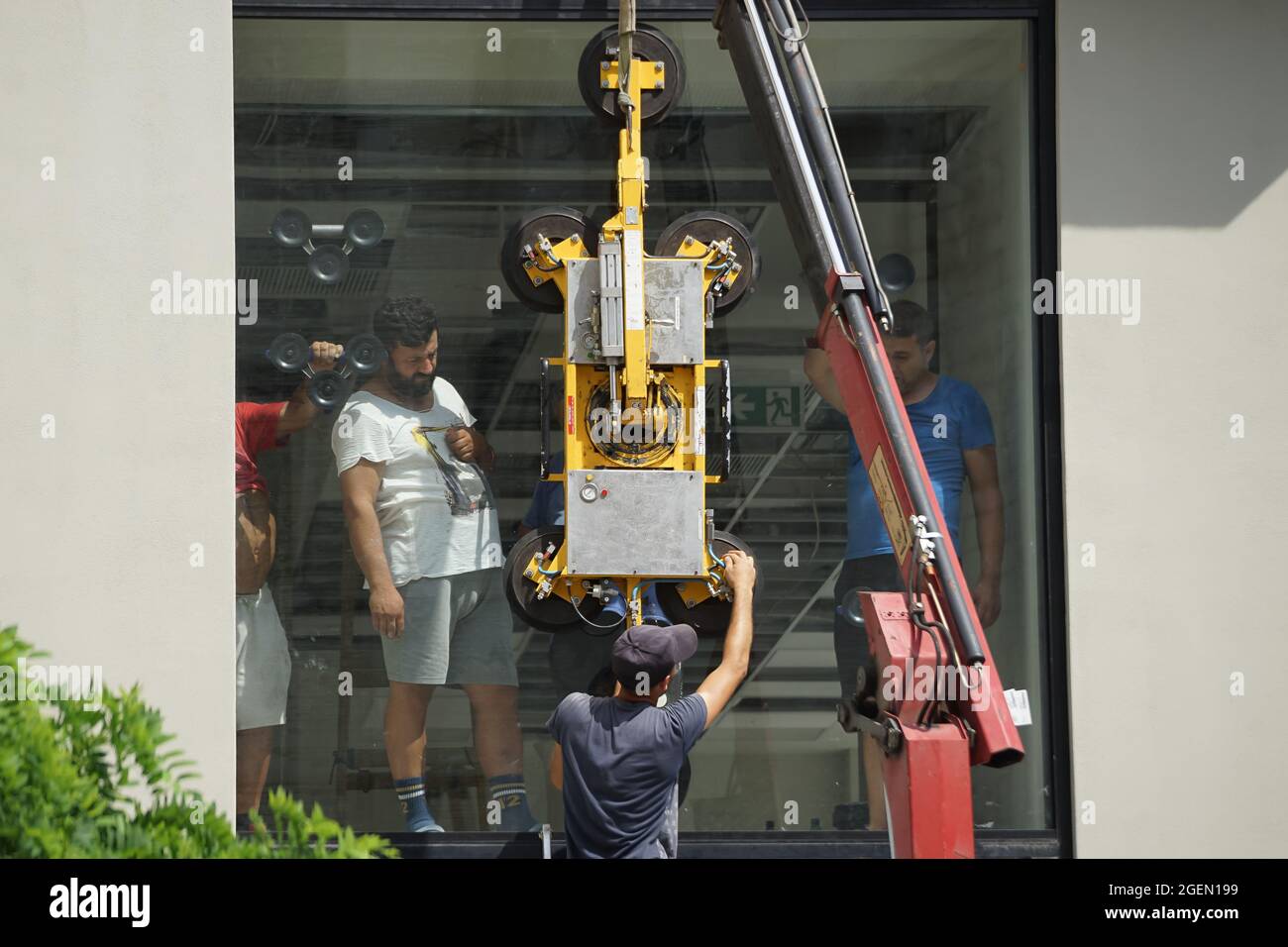 Bucharest, Romania - August 12, 2021: Workers install a very large ...