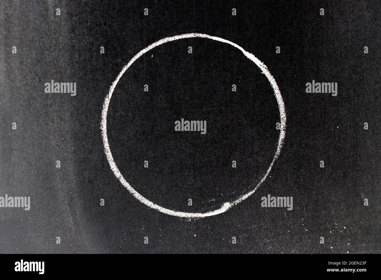 White chalk drawing in circle shape on black board background Stock ...